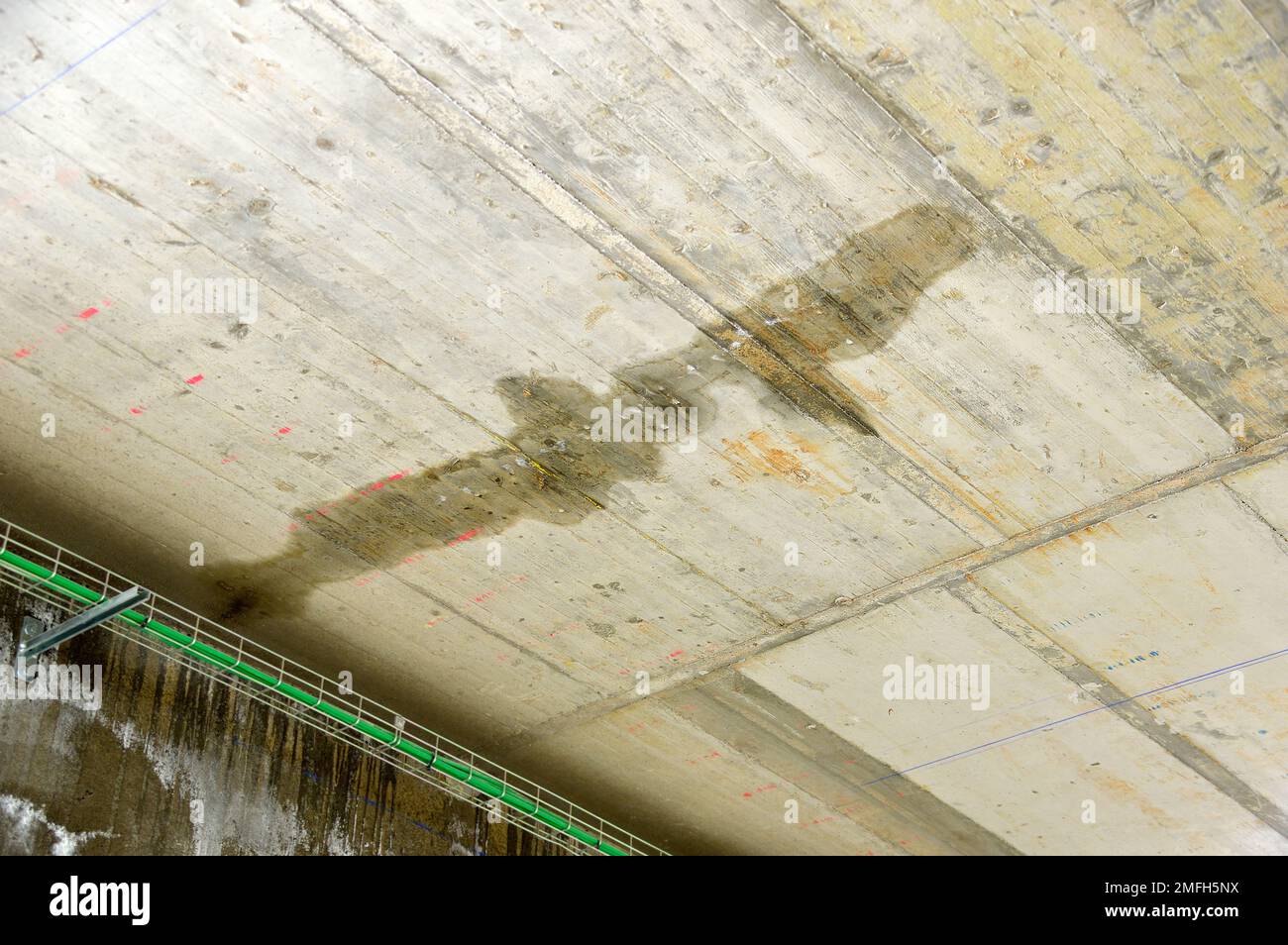 Rain water leaks on the roof causing damage Stock Photo - Alamy