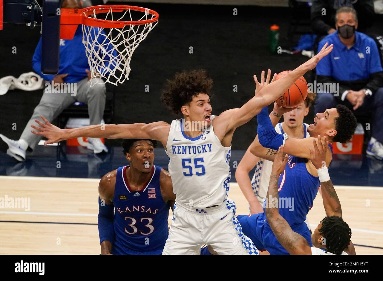 Kansas' Jalen Wilson (10) shoots as Kentucky's Lance Ware (55) defends ...