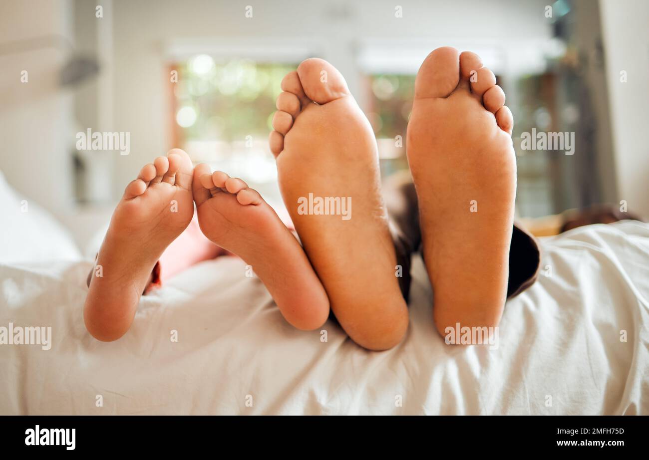 Love Bed And Feet Of Father And Girl Enjoying Quality Time Holiday