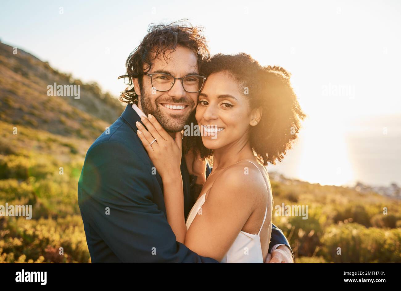 Portrait, wedding couple and interracial marriage hug in nature, happy ...
