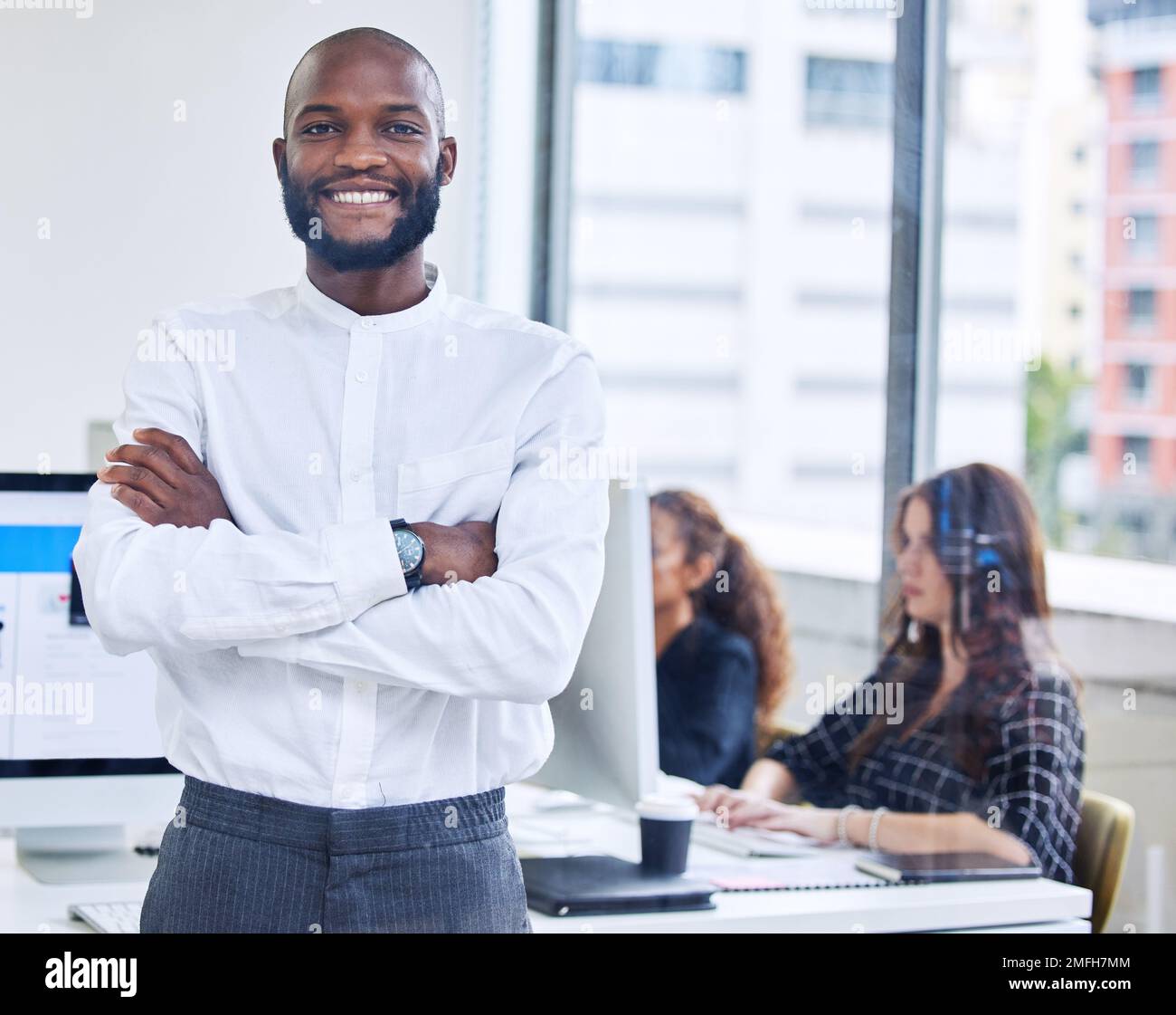 Happy african office worker hi-res stock photography and images - Alamy