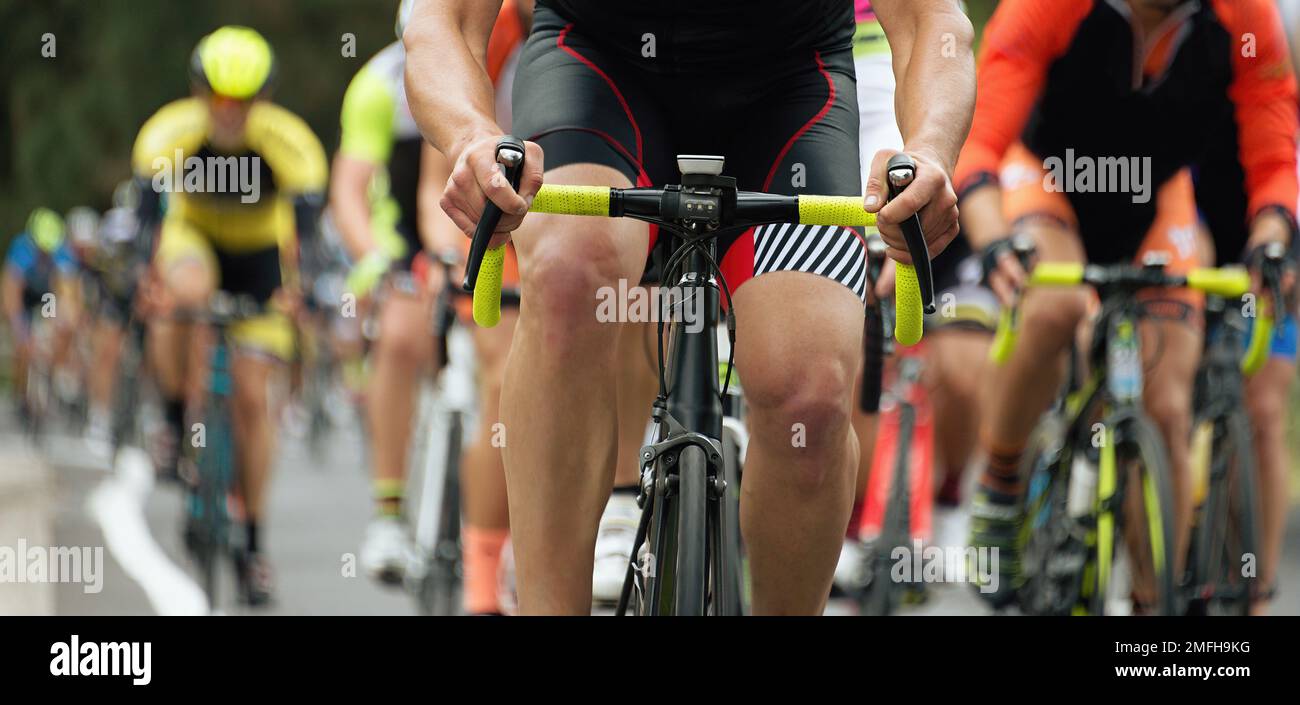 Cycling competition, cyclist athletes riding a race Stock Photo - Alamy