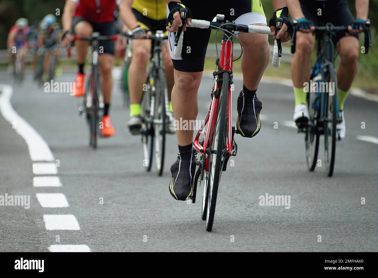 Cycling competition, cyclist athletes riding a race Stock Photo - Alamy