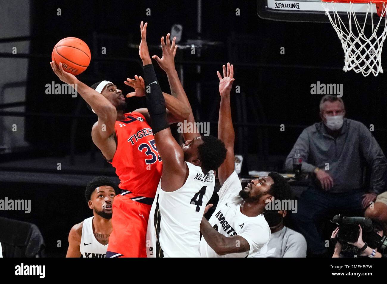 Auburn guard Devan Cambridge (35) attempts to shoot over Central ...