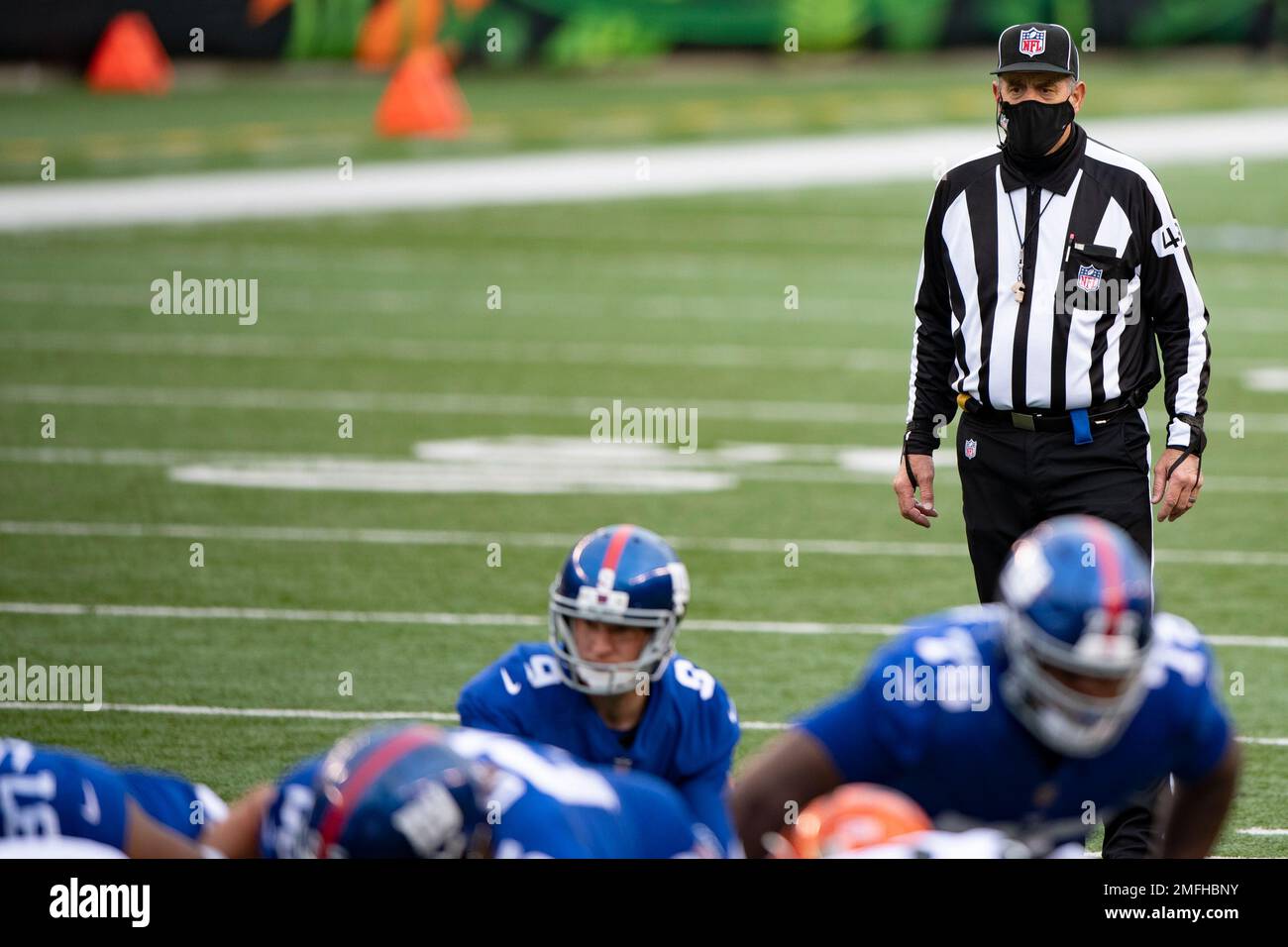 Head linesman Jim Mello (48) during an NFL football game against the ...