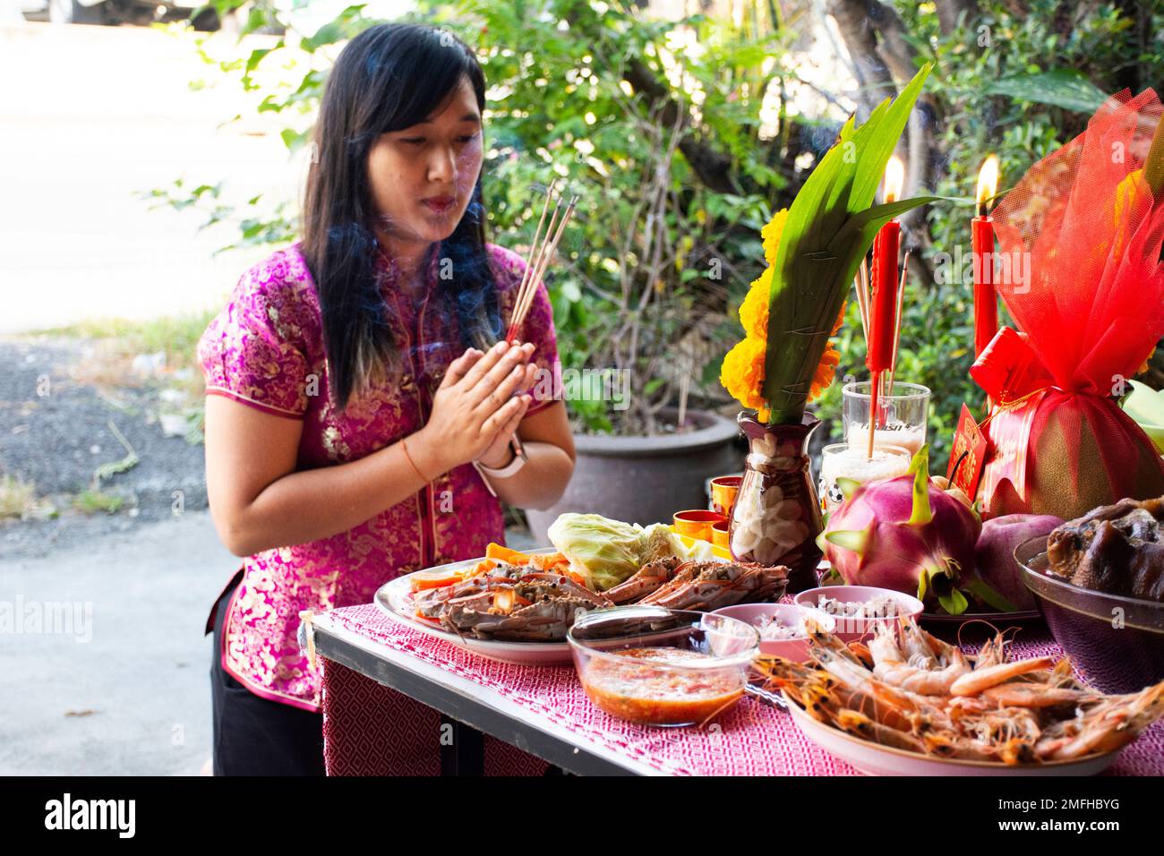 Thai people preparing Sacrificial offering and food drinks for rite ...