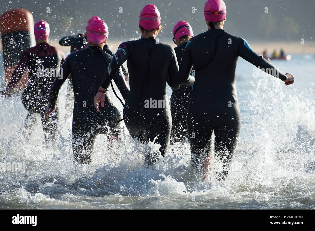 Women race ocean swim hi-res stock photography and images - Alamy
