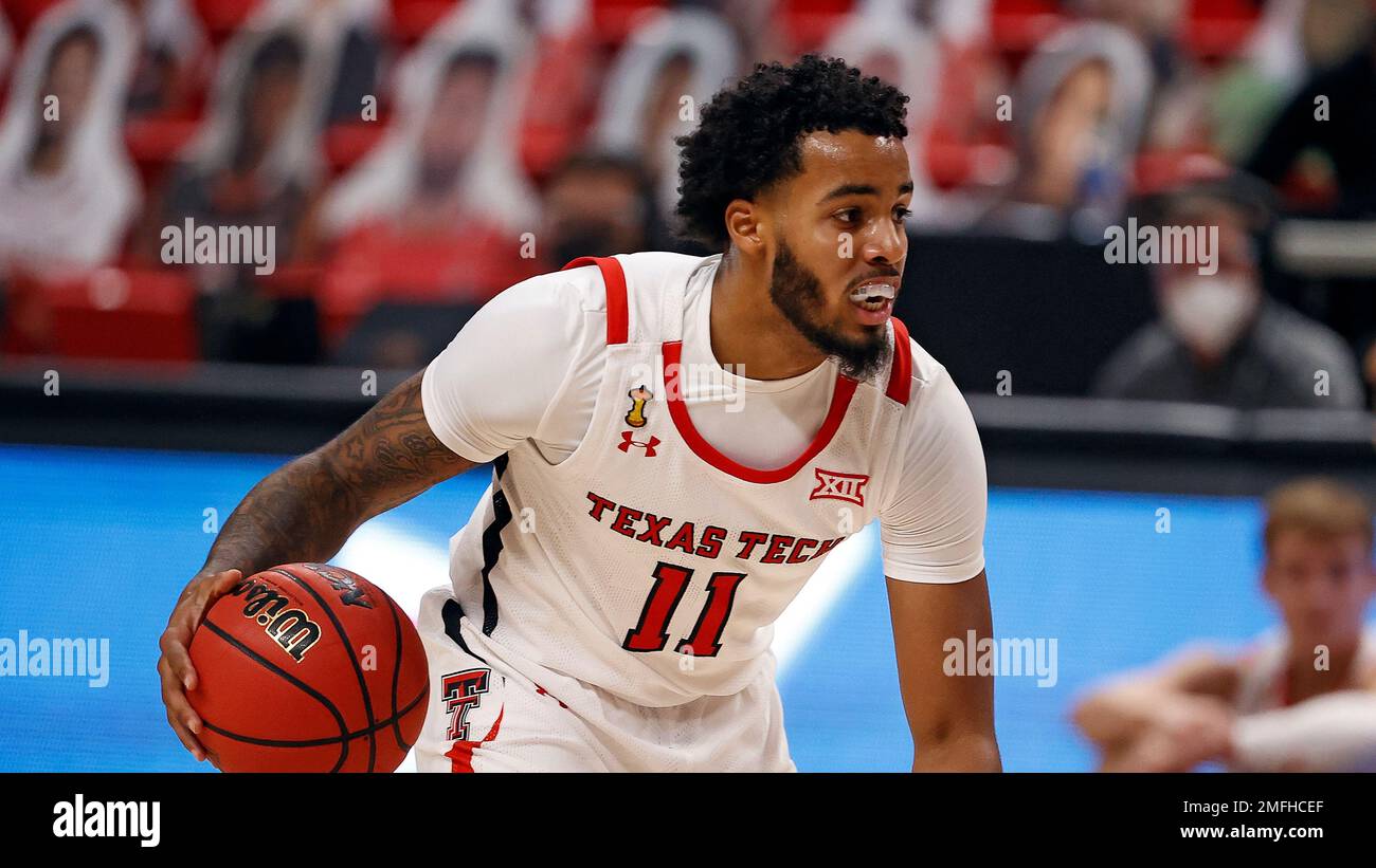 Texas Tech's Kyler Edwards (11) dribbles the ball during the first half ...
