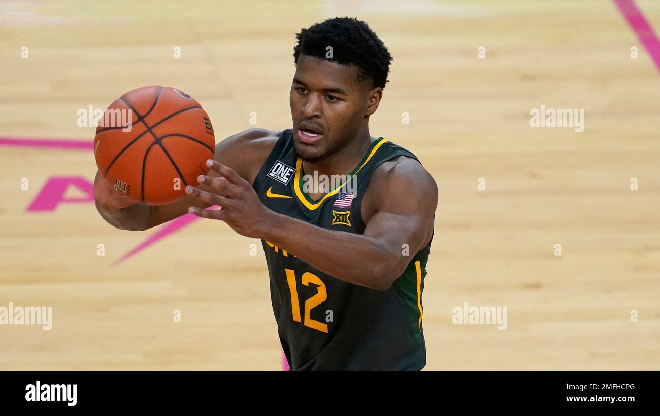 Baylor's Jared Butler (12) plays against Washington in an NCAA college ...