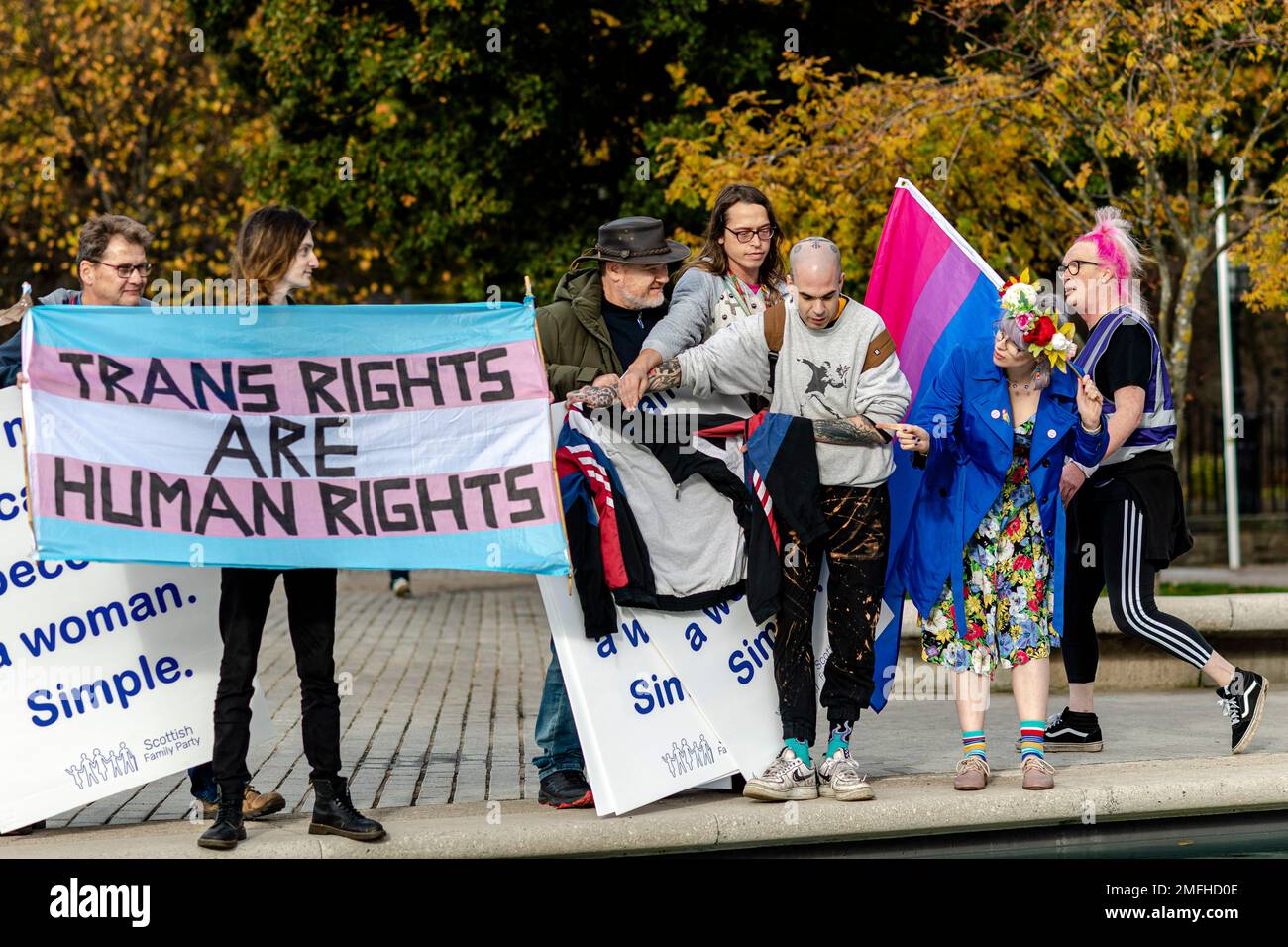 Anti trans bill protesters are covered up by Pro trans campaigners ...