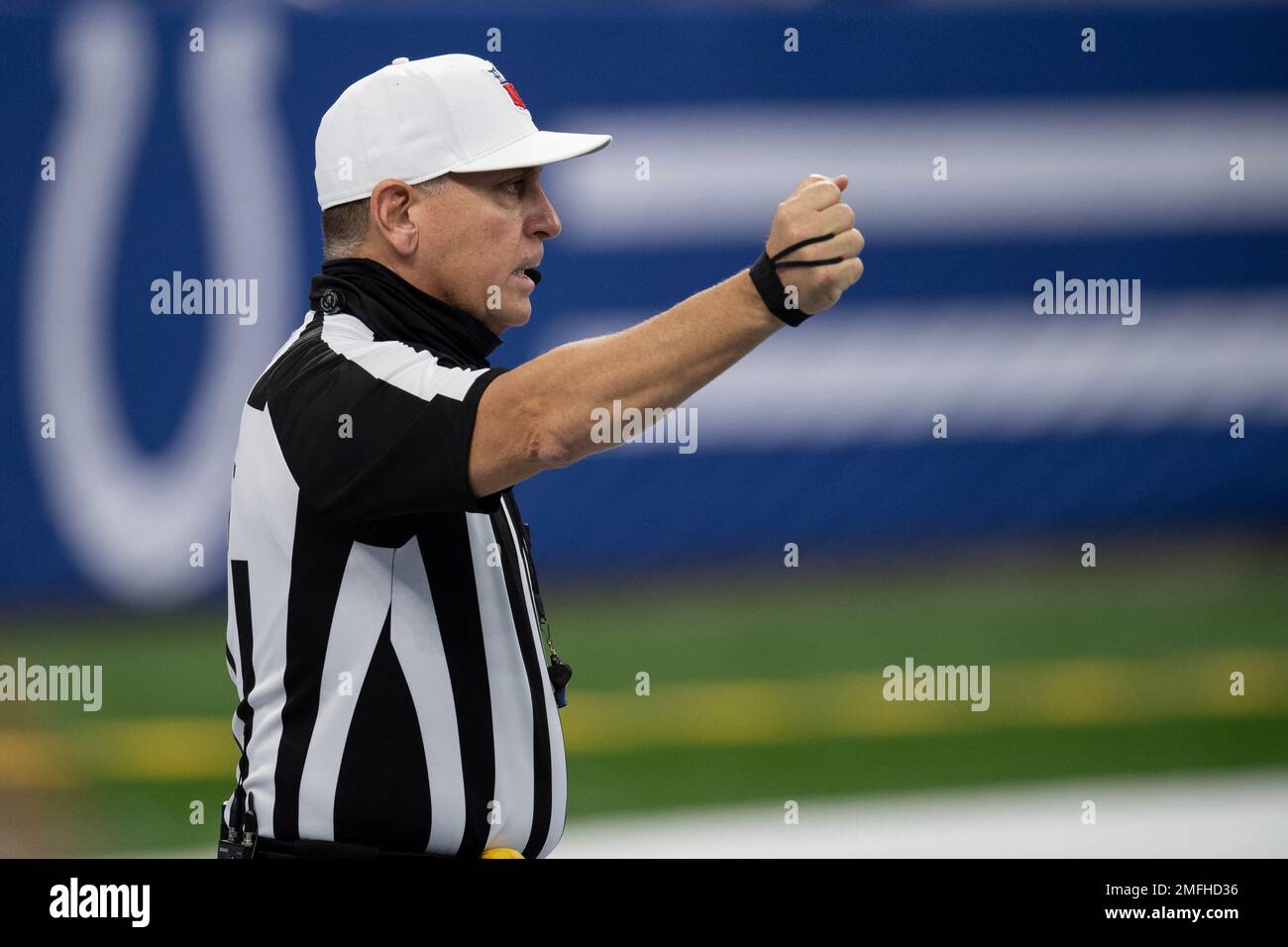 NFL referee John Hussey (35) signals on the field during an NFL ...