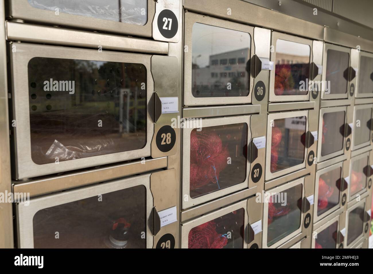 Wall with lockers, metal doors with glass windows, unmanned sale of ...