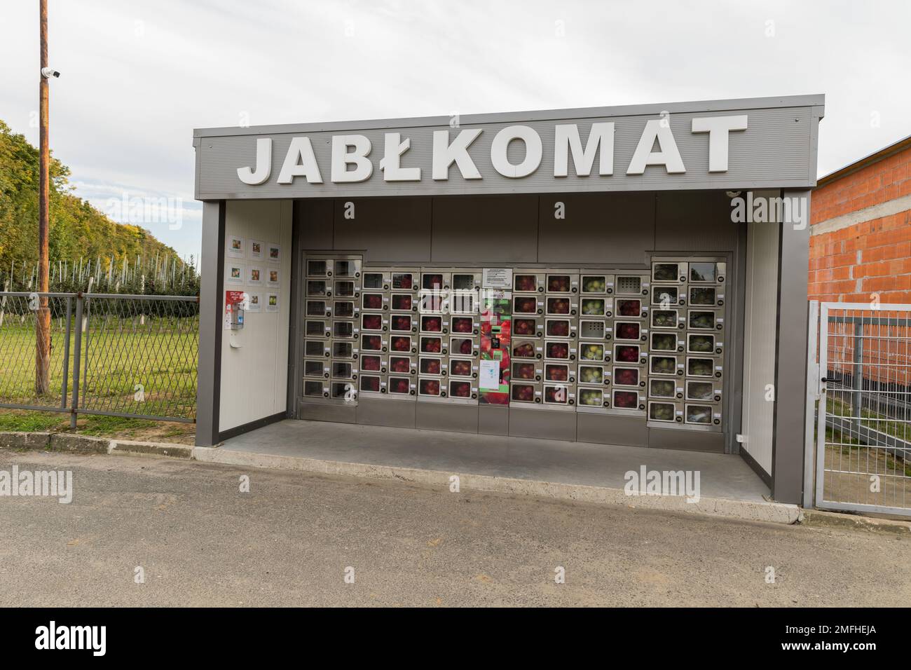 Apple vending machine by the road. Text translation - applemat Stock ...