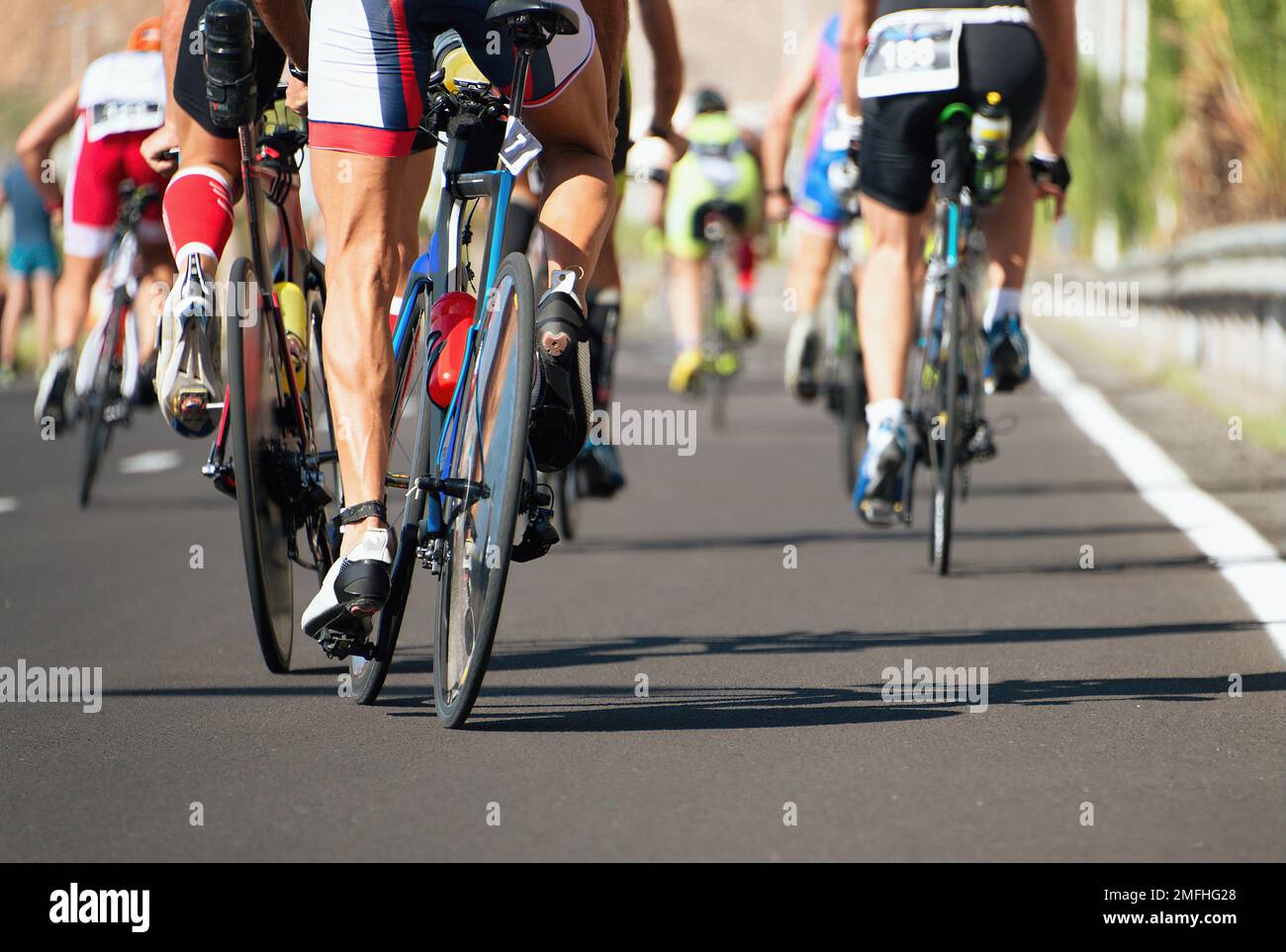 Cycling competition race at high speed, view from behind Stock Photo ...
