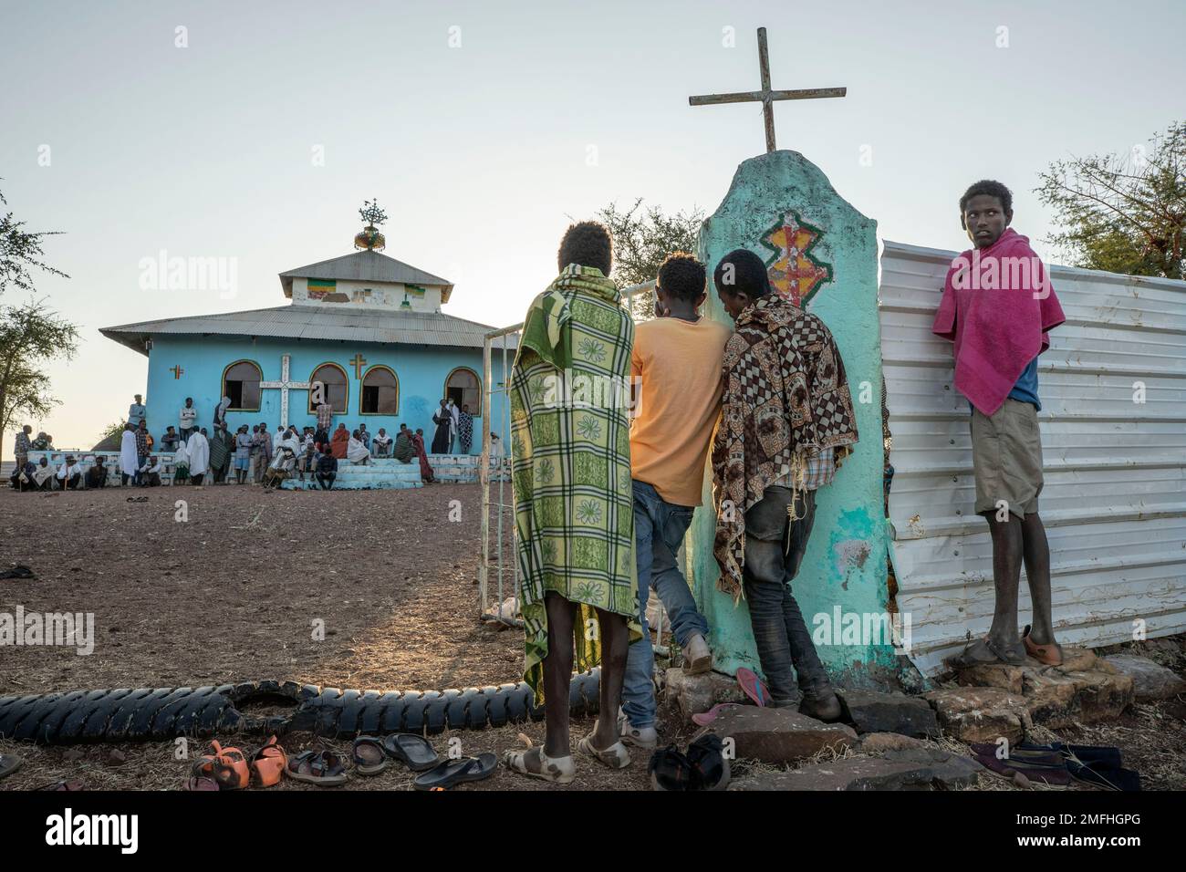 Tigrayan men who fled the conflict in Ethiopia's Tigray region, listen ...