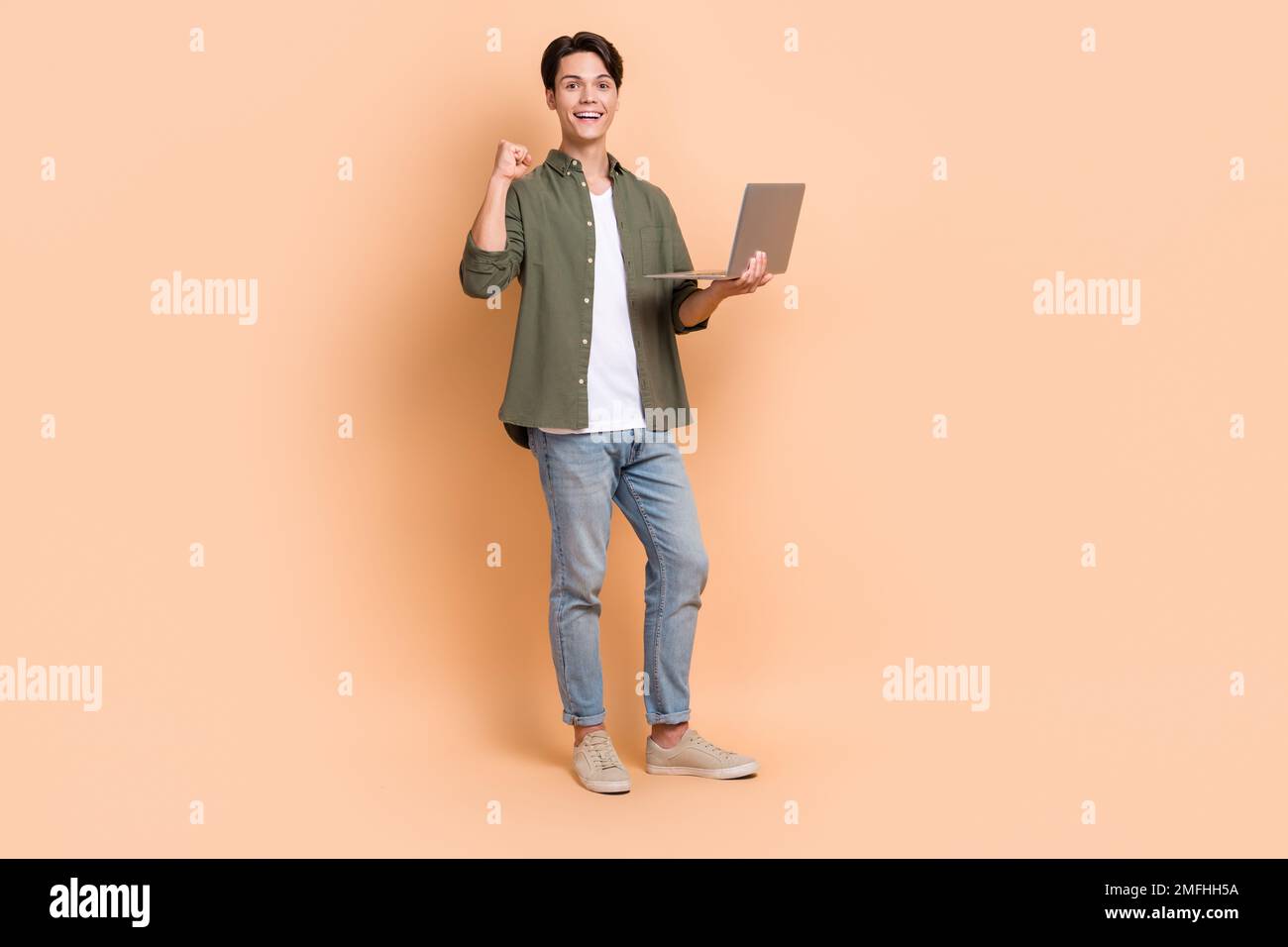 Full body size photo of young man work freelance it programmer ...