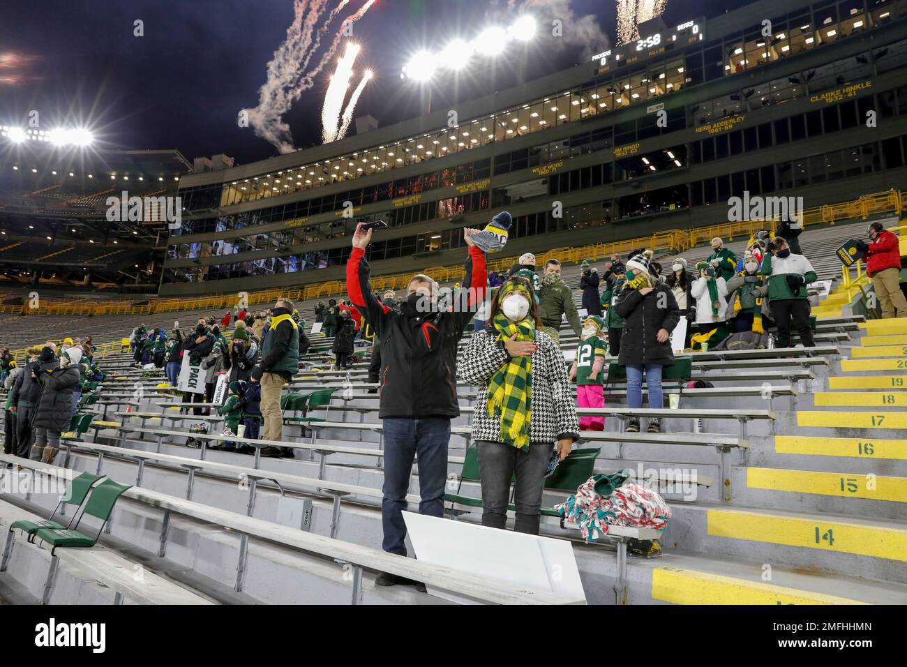A limited number of fans watch during the national anthem before an NFL ...