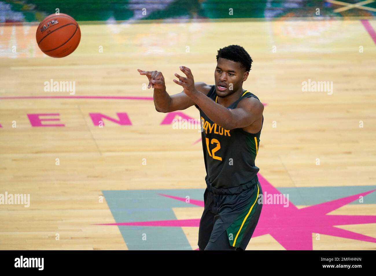 Baylor's Jared Butler (12) plays against Washington in an NCAA college ...