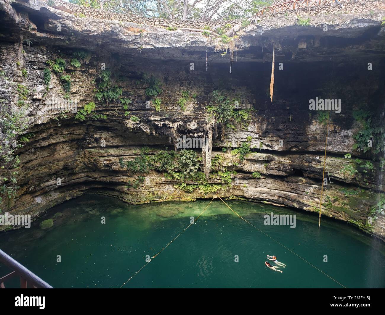 Couple swimming in cave hi-res stock photography and images - Alamy