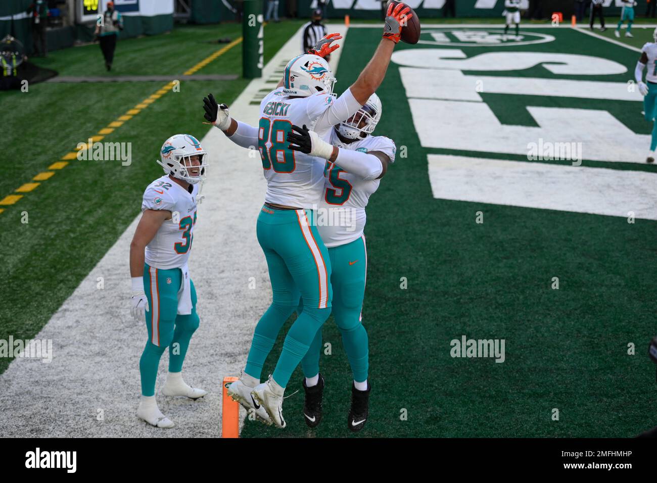 Miami Dolphins' Mike Gesicki (88), center, celebrates his touchdown ...