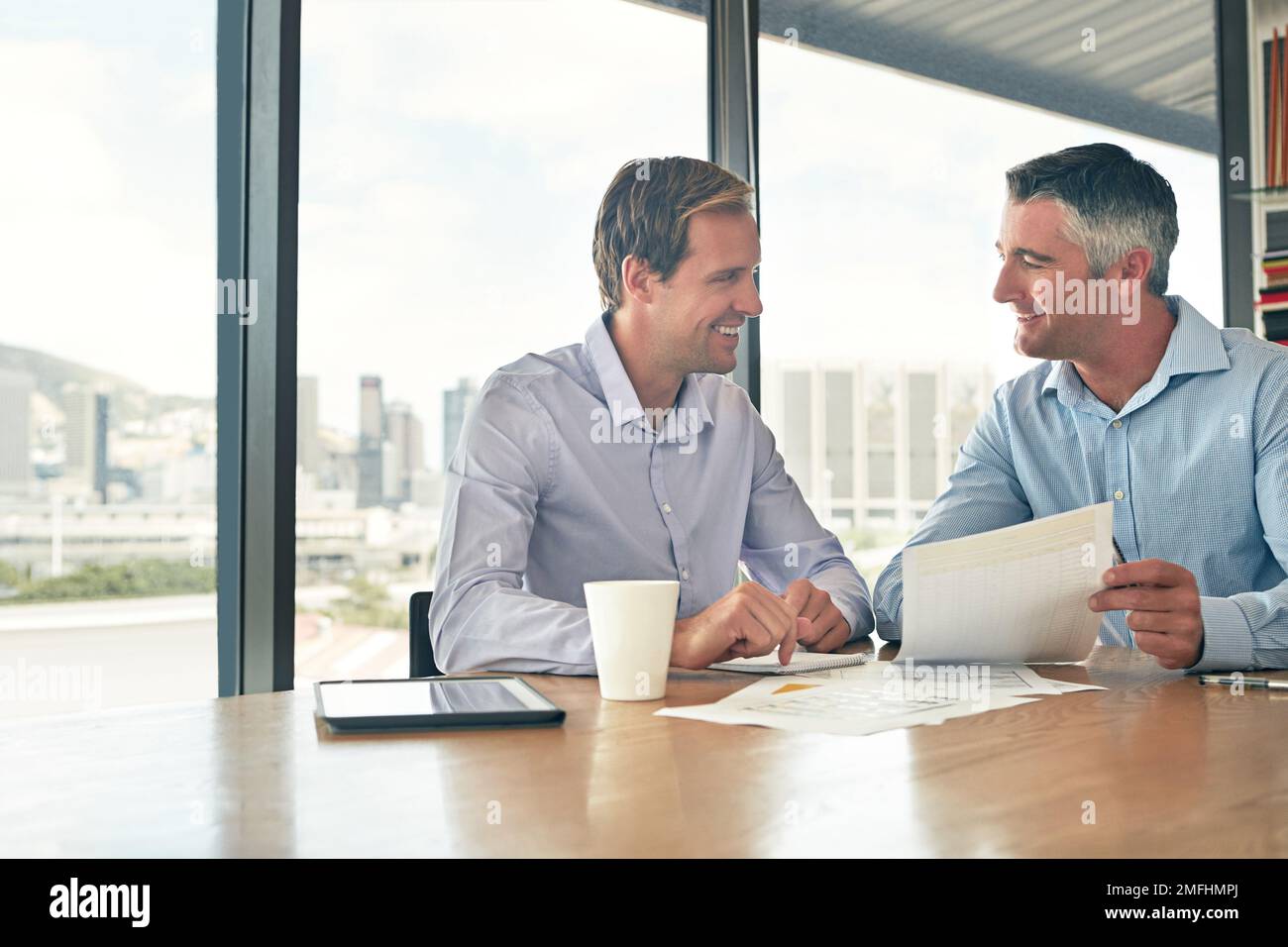 Business meeting, team and talking about documents, corporate planning ...