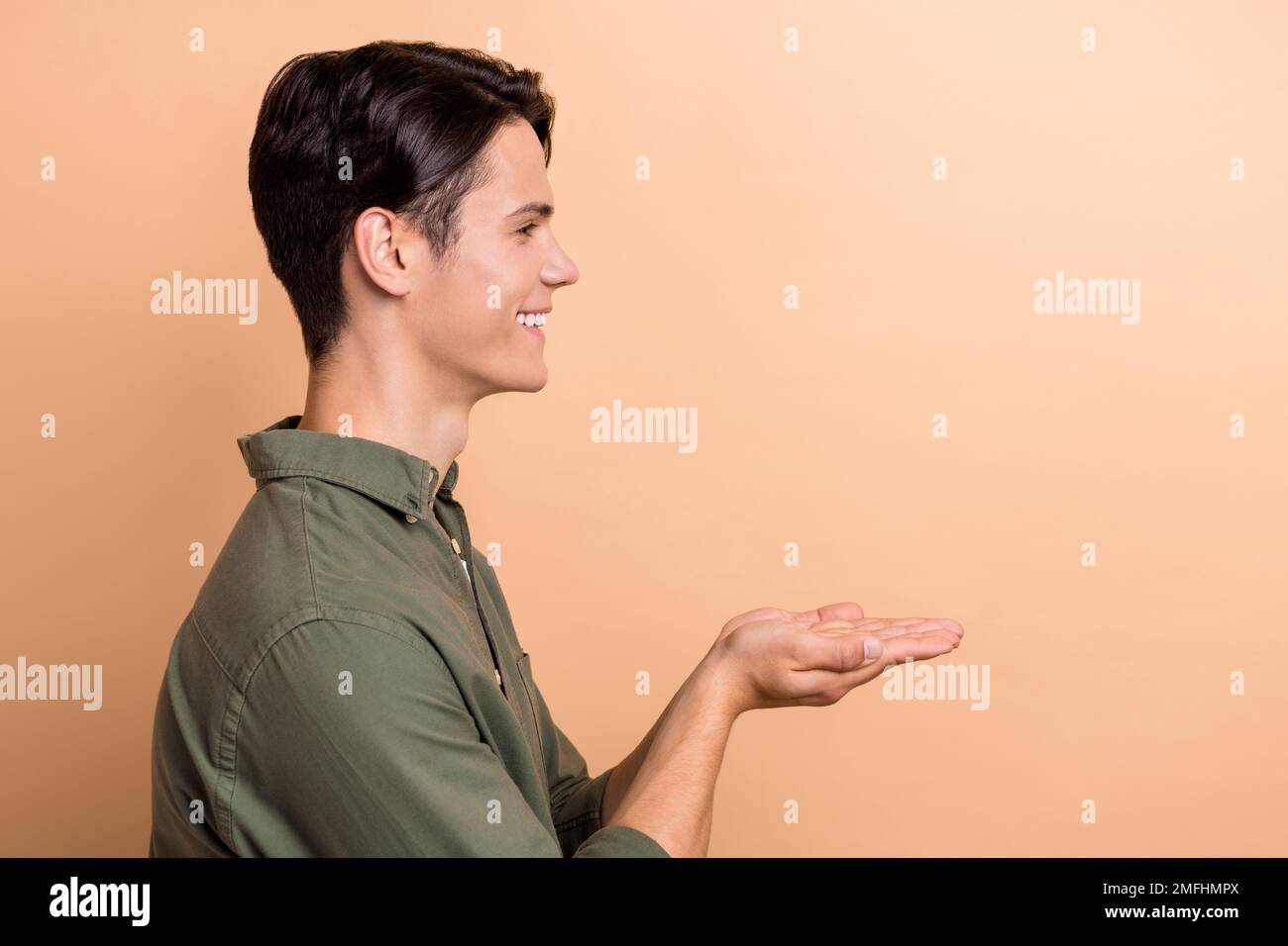 Profile photo of young promoter guy student new university hold his ...