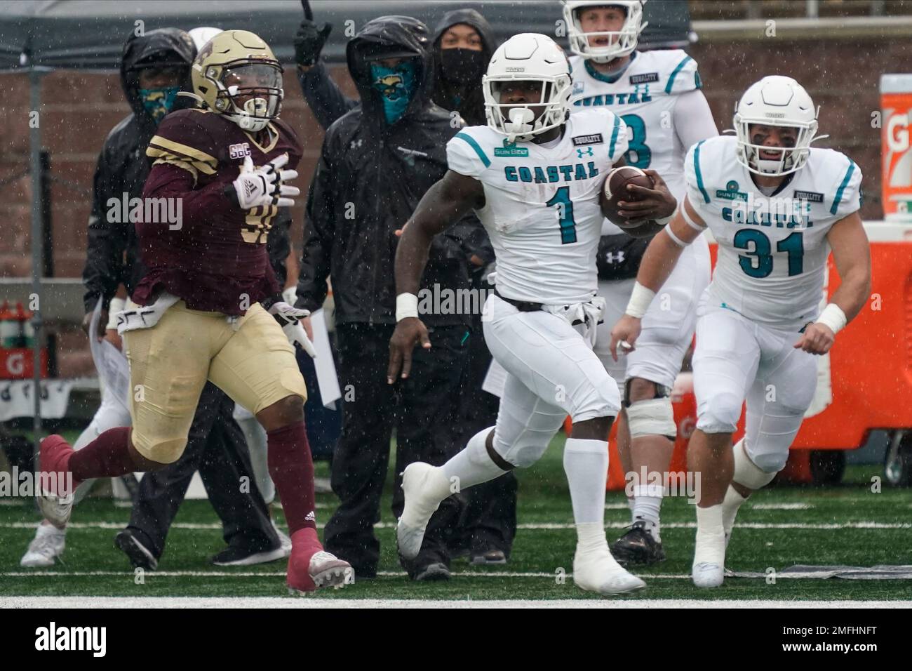 Coastal Carolina's CJ Marable (1) runs for a long gain against Texas ...