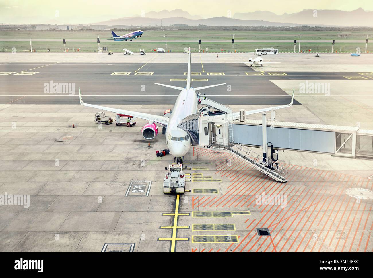 Airport, travel and airplane loading cargo for takeoff, international ...