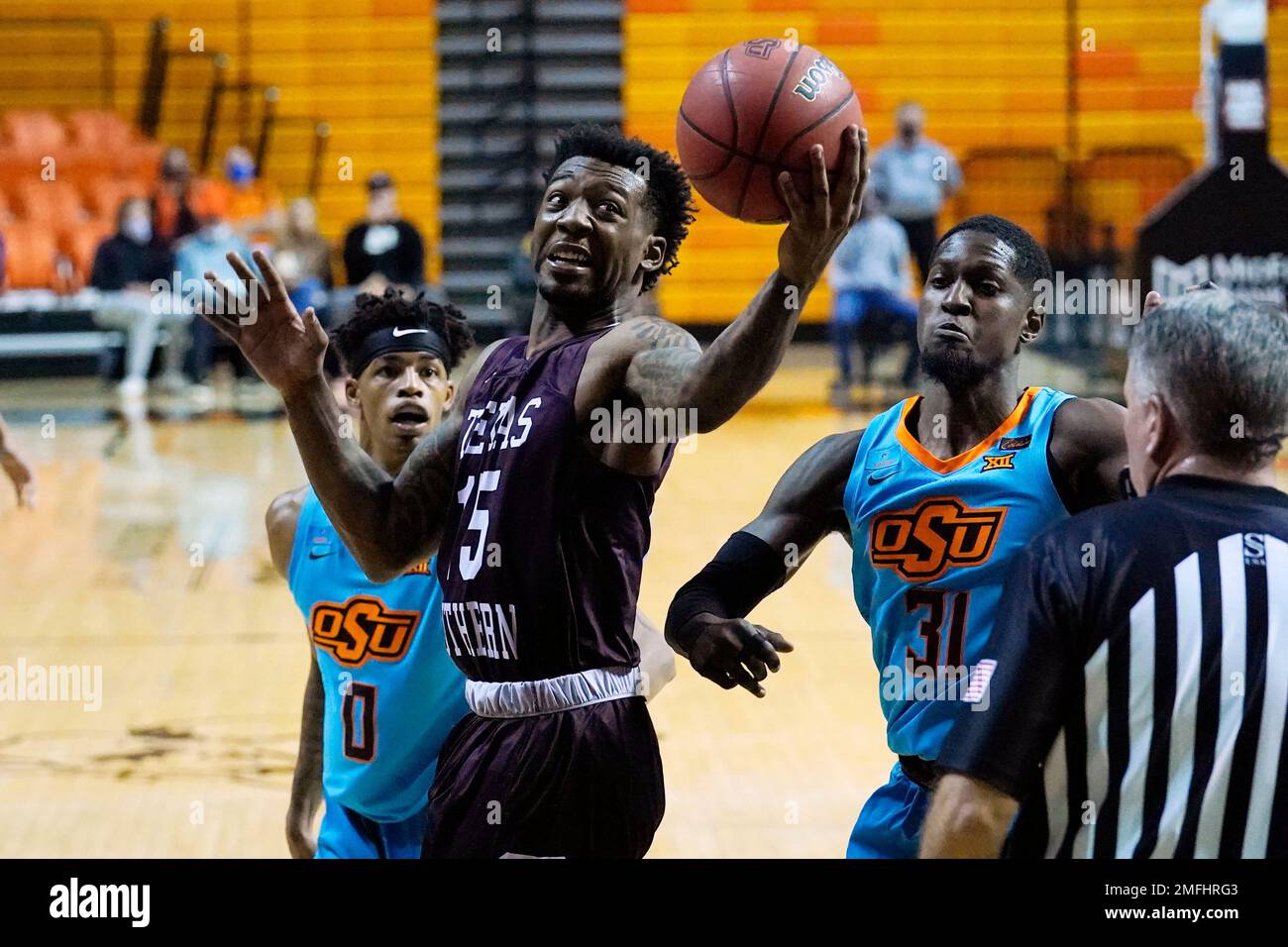 Texas Southern's Justin Hopkins (15) reaches for the ball in front of ...