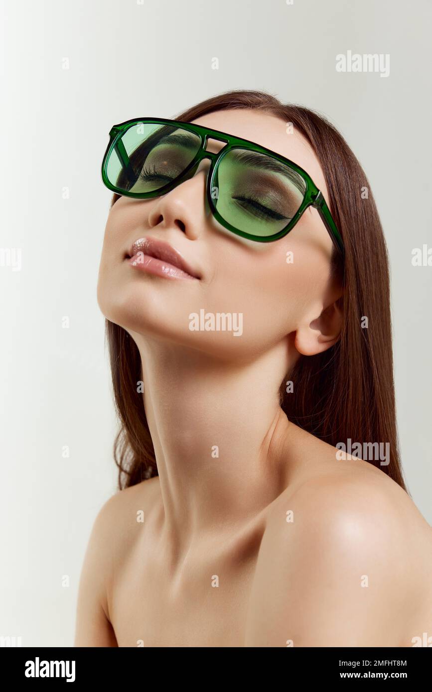 Enjoyment. Portrait of young beautiful girl with smooth healthy skin ...