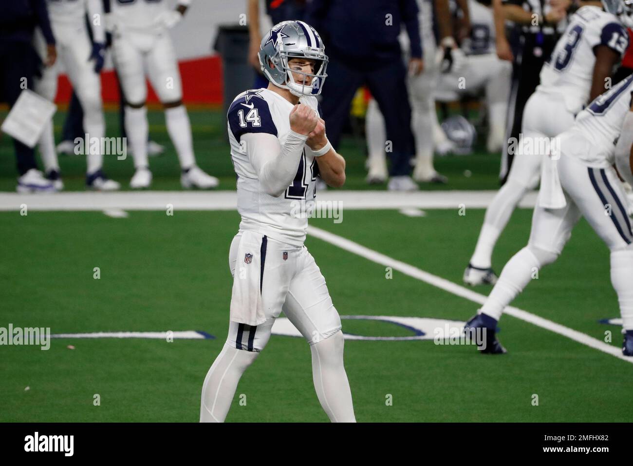 Dallas Cowboys quarterback Andy Dalton signals before the snap during ...