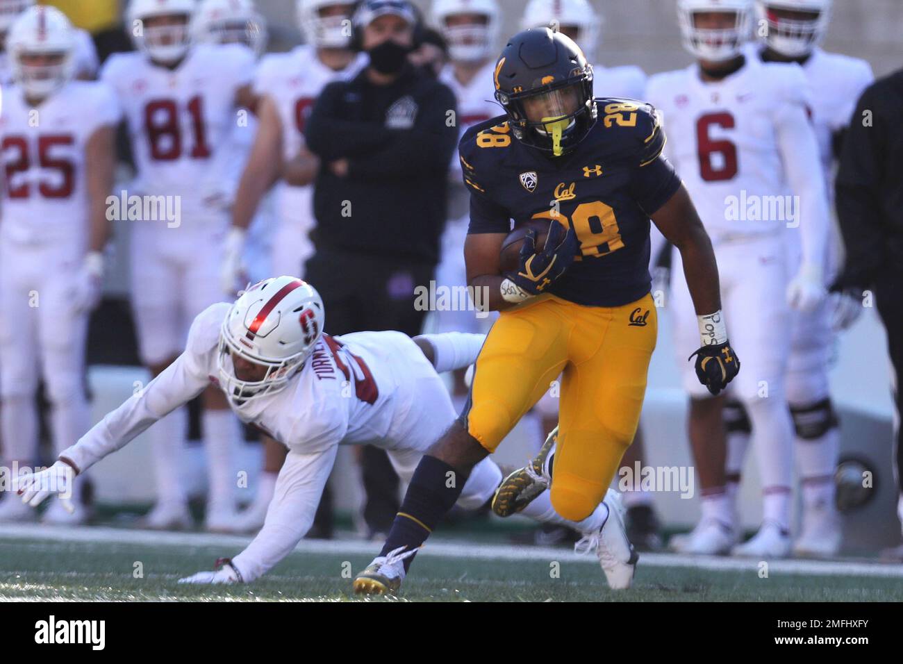 California running back Damien Moore (28) carries past Stanford ...
