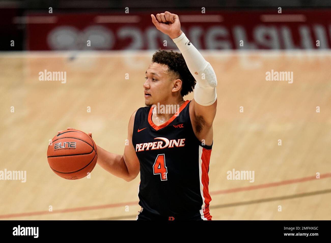Pepperdine guard Colbey Ross brings the ball up during the second half ...