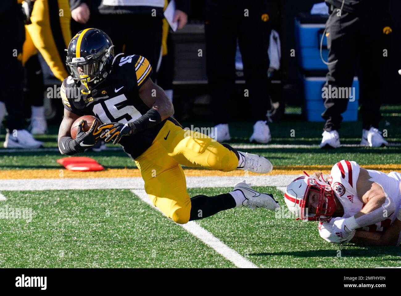 Iowa running back Tyler Goodson (15) is tackled by Nebraska linebacker ...