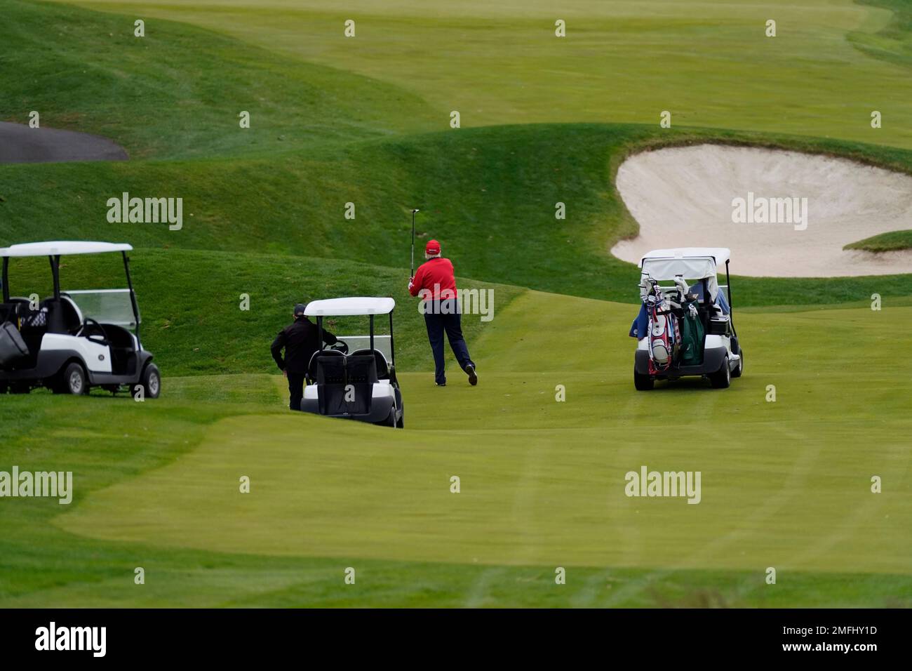 President Donald Trump plays golf at Trump National Golf Club, Friday ...