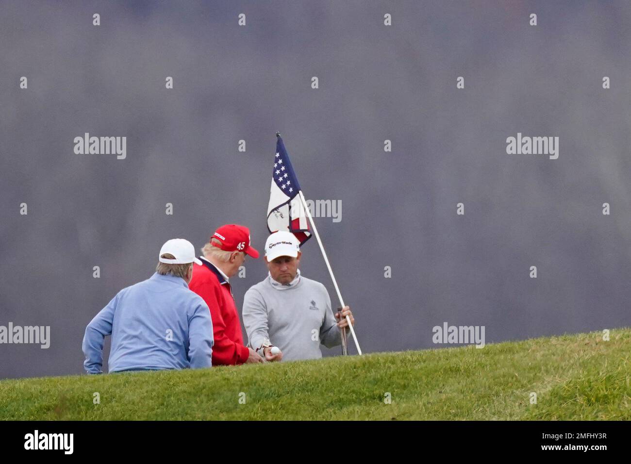 President Donald Trump plays golf at Trump National Golf Club, Friday ...