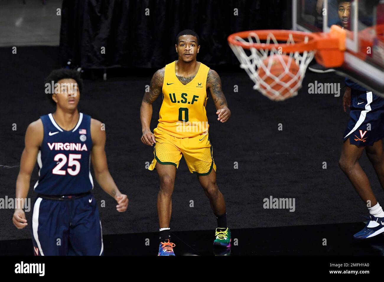 San Francisco's Khalil Shabazz, center, watches his 3-point basket go ...