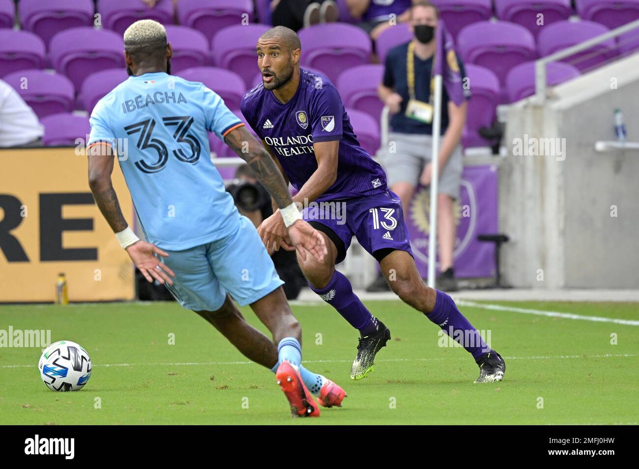 Orlando City forward Tesho Akindele (13) controls a ball in front of ...