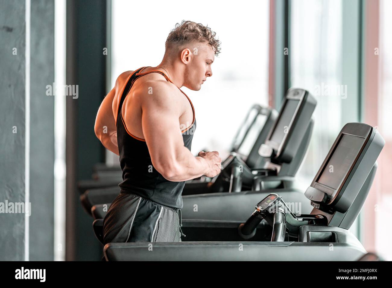 Exercising in gym treadmill cardio hi-res stock photography and images ...