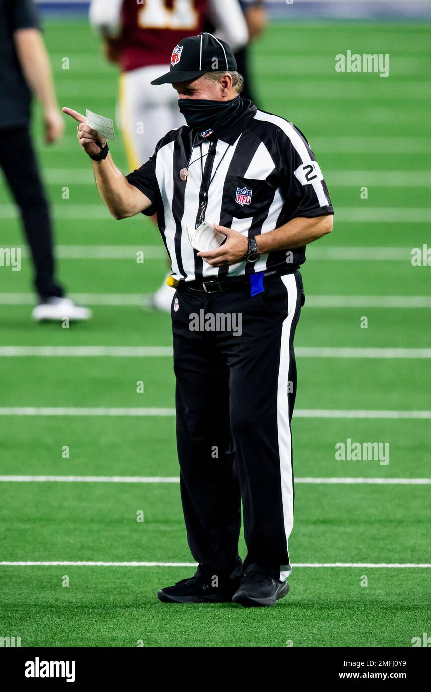 Side judge Jeff Lamberth (21) signals during an NFL football game ...