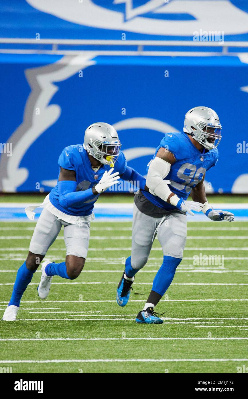 Detroit Lions safety Jayron Kearse (42) and Detroit Lions defensive end ...