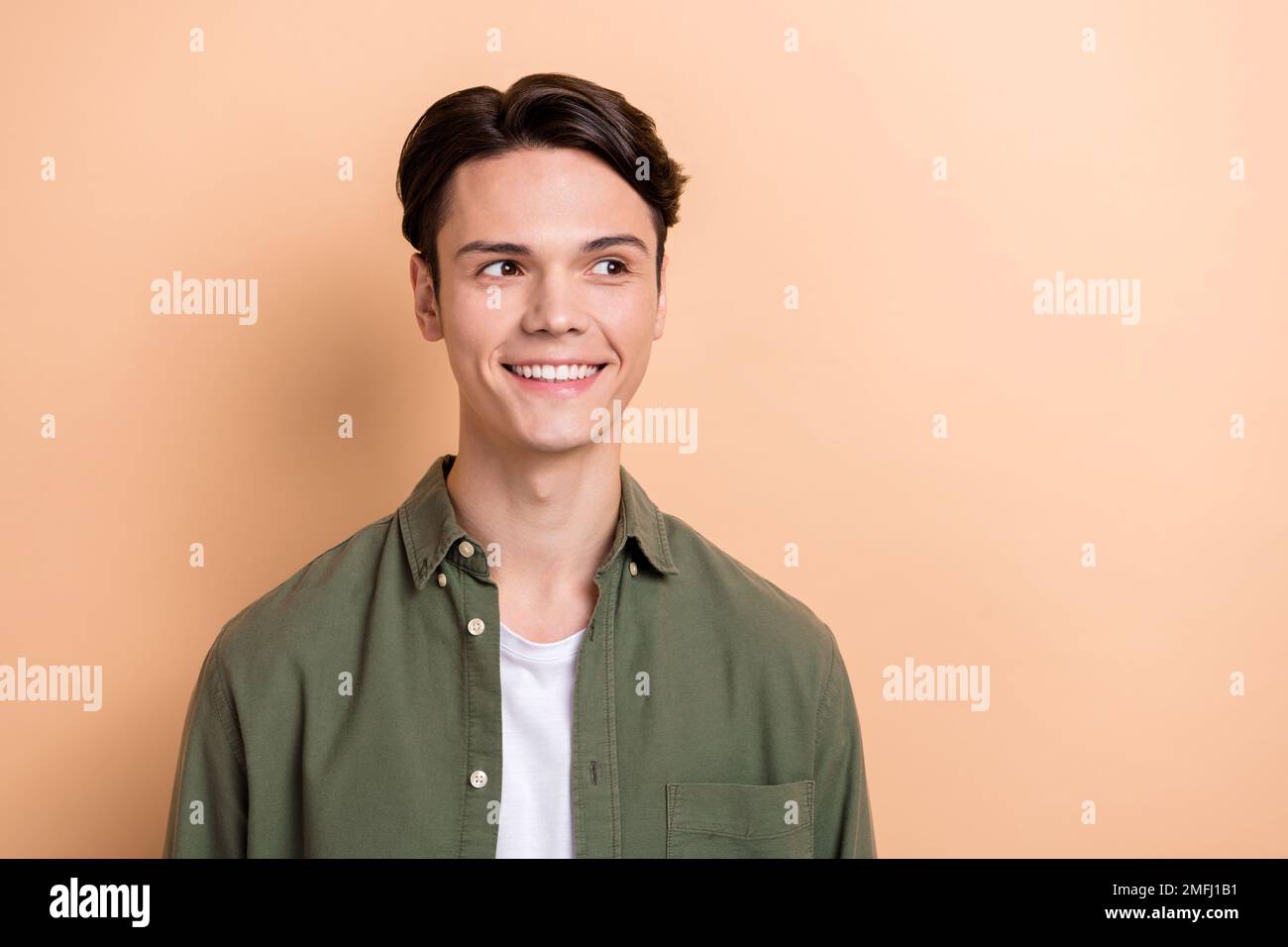 Photo of positive cheerful person beaming smile look interested empty ...