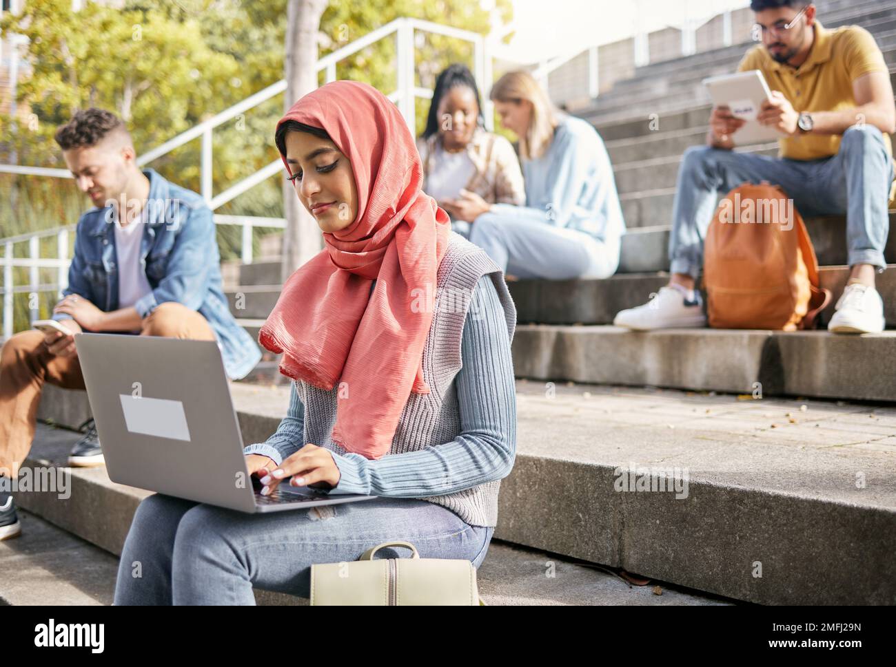 Students on stairs, Islamic woman and laptop for typing, connection and ...