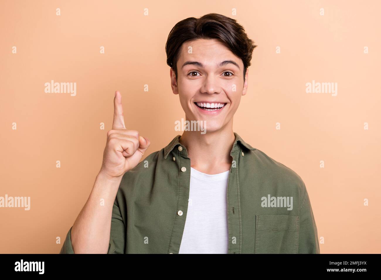 Photo of cheerful smart person beaming smile point finger brilliant ...