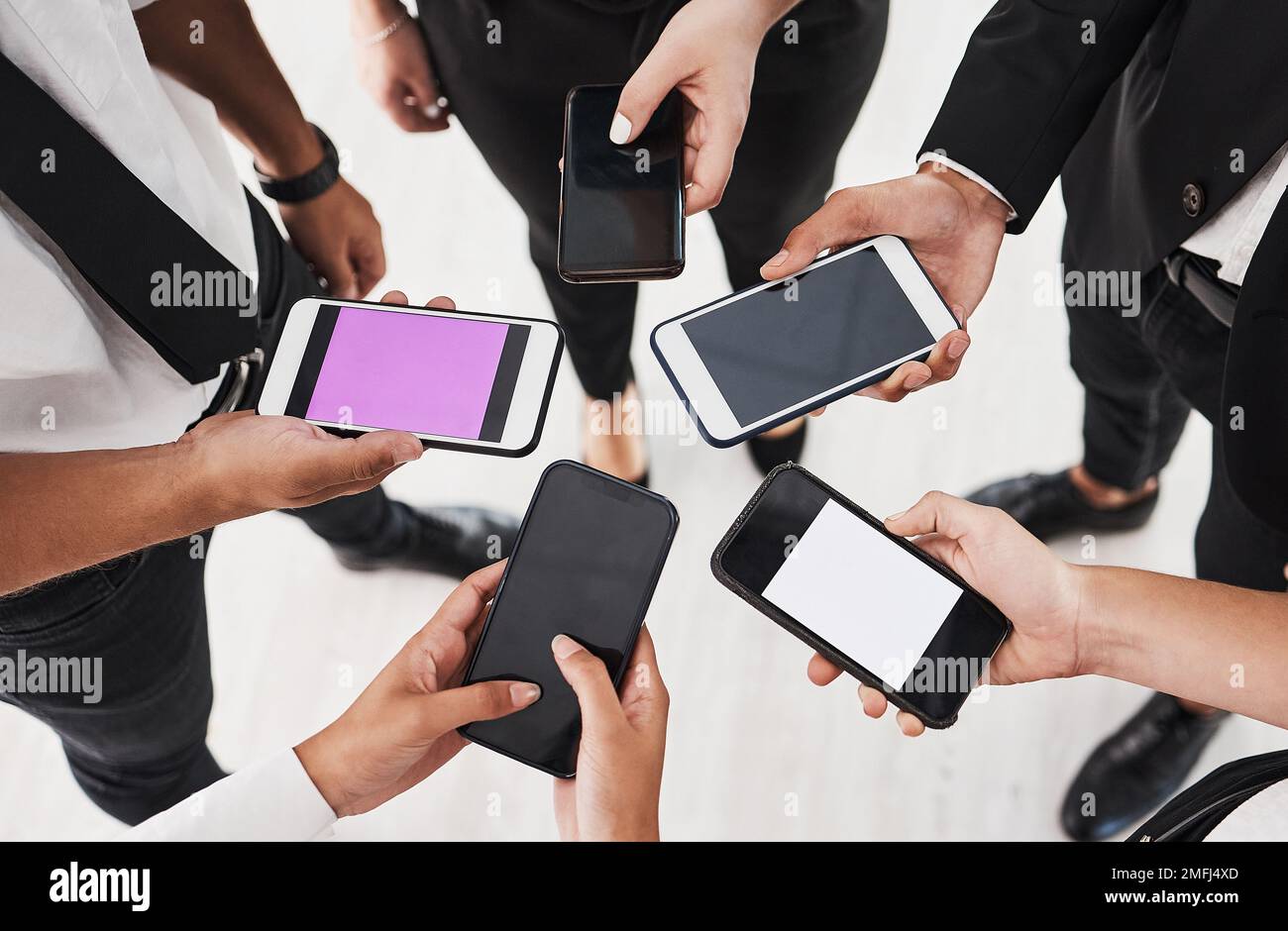 Phone, hands and business people group networking, sharing and data ...