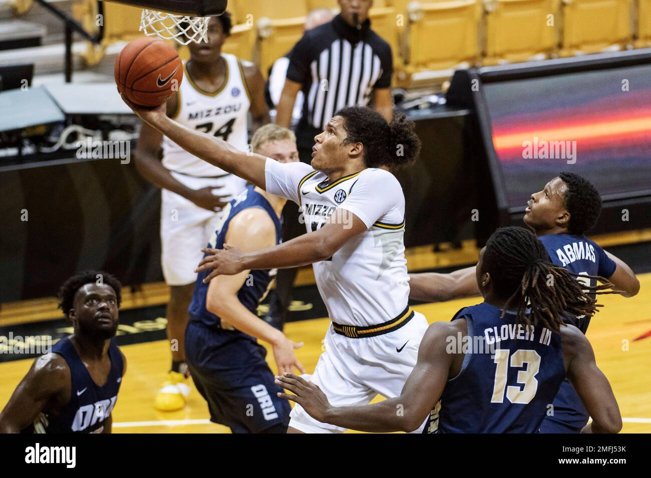 Missouri's Dru Smith, top, shoots over four Oral Roberts defenders ...