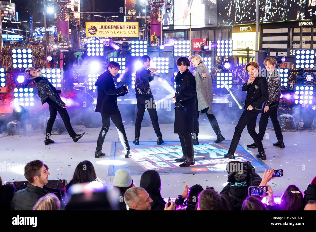 FILE - Members of BTS perform at the Times Square New Year's Eve ...