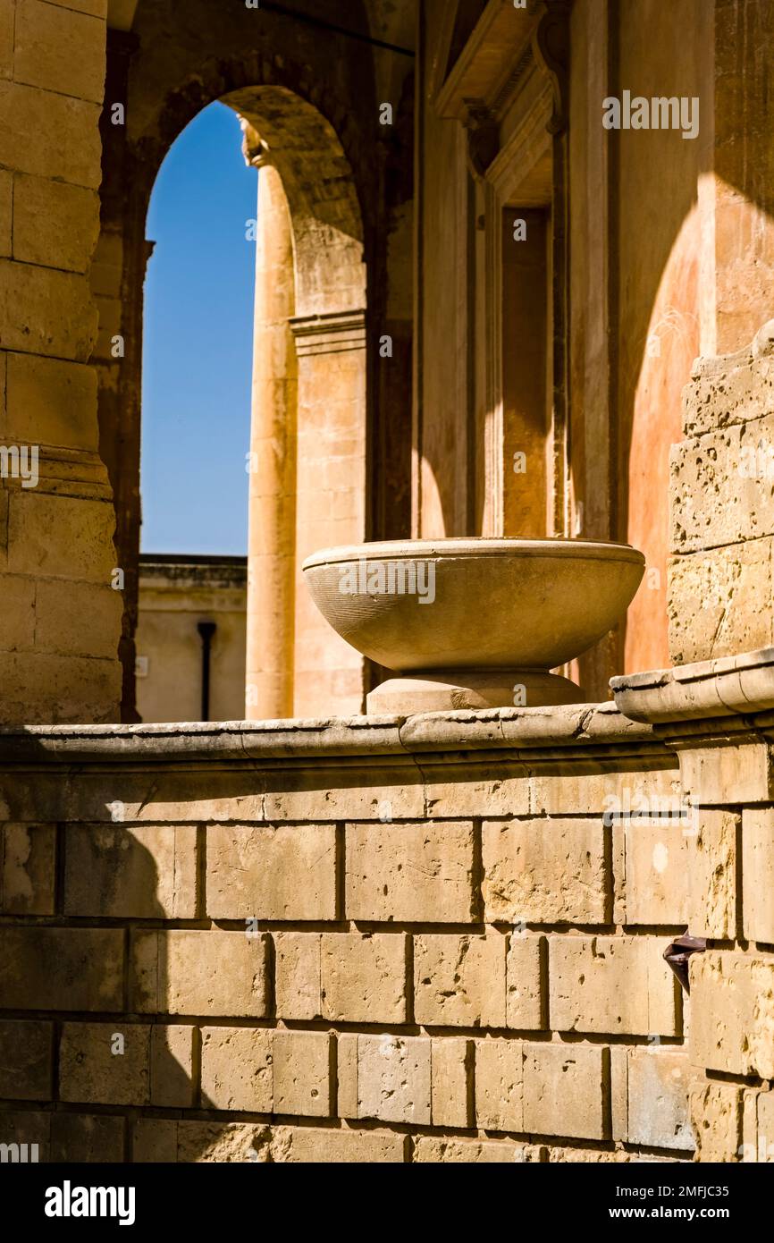 Niche of a house with a terracotta bowl and an arch in the Late Baroque ...
