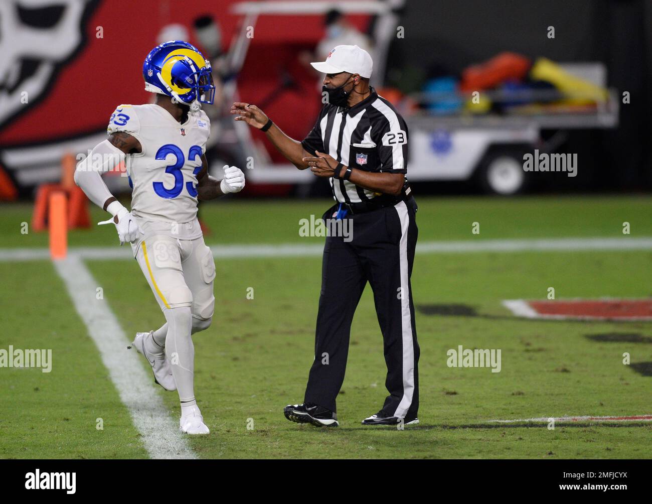 NFL referee Jerome Boger (23) talks to Los Angeles Rams safety Nick ...