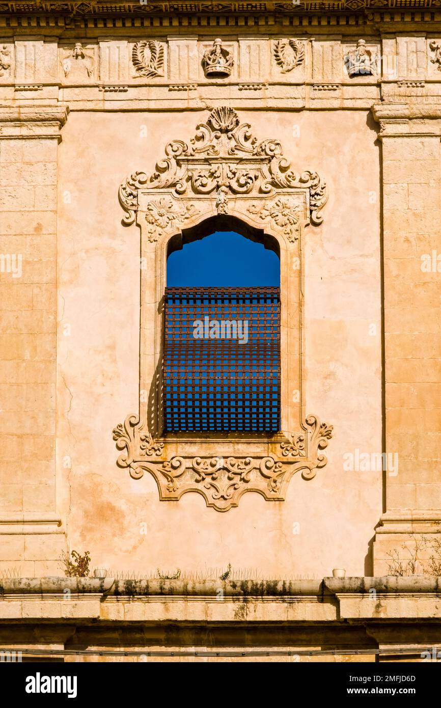 Facade of a house with an artful window in the Late Baroque town of ...